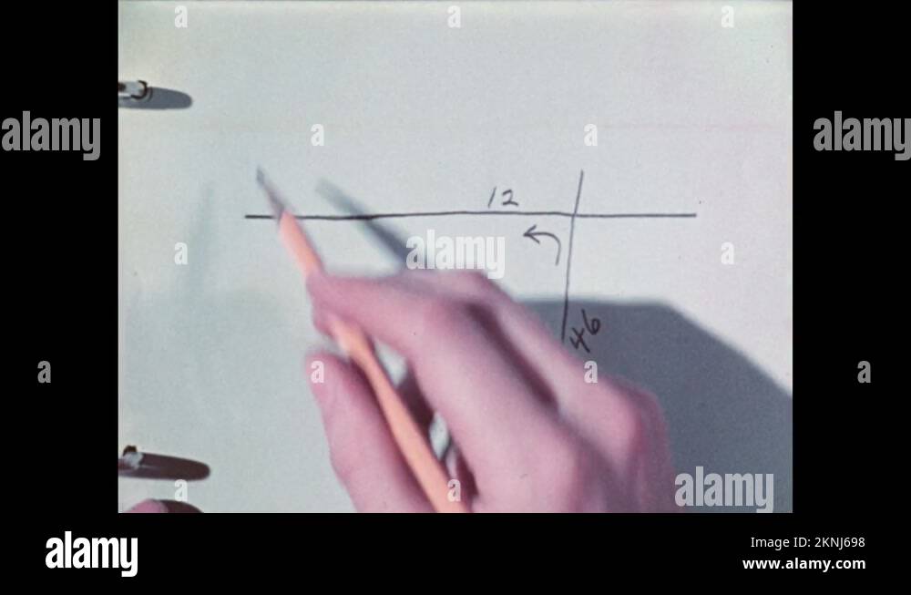 1940s: Writing on piece of paper. Hand draws map with pencil. Building ...