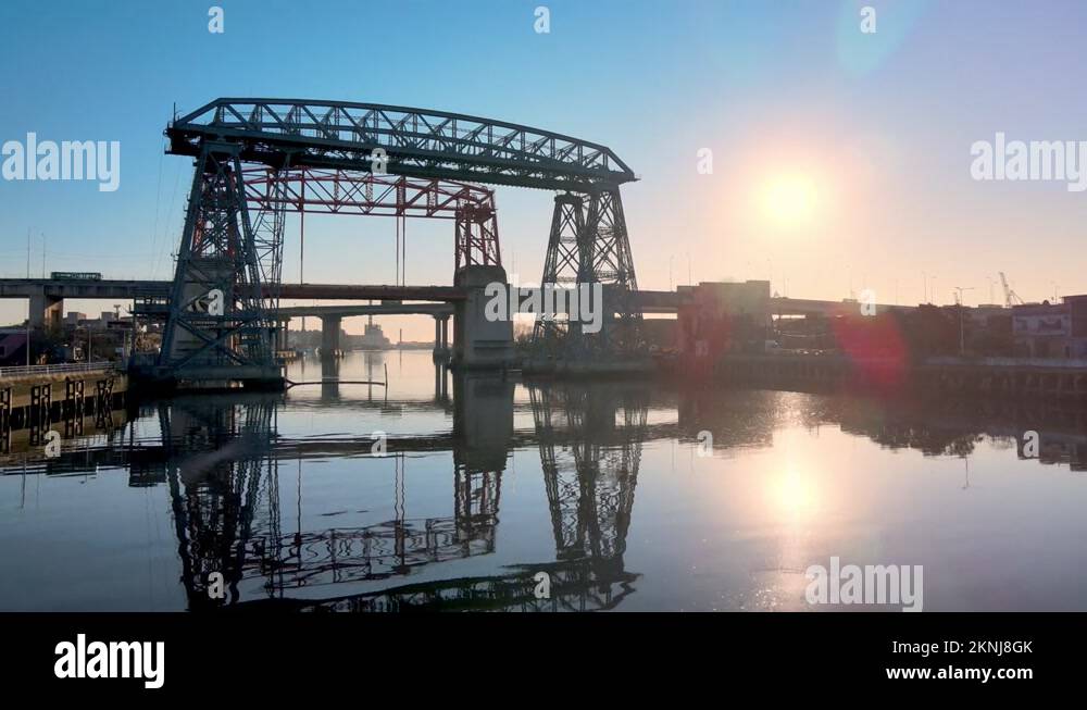 Aerial dolly out shot capturing the tranquil morning of the port with ...
