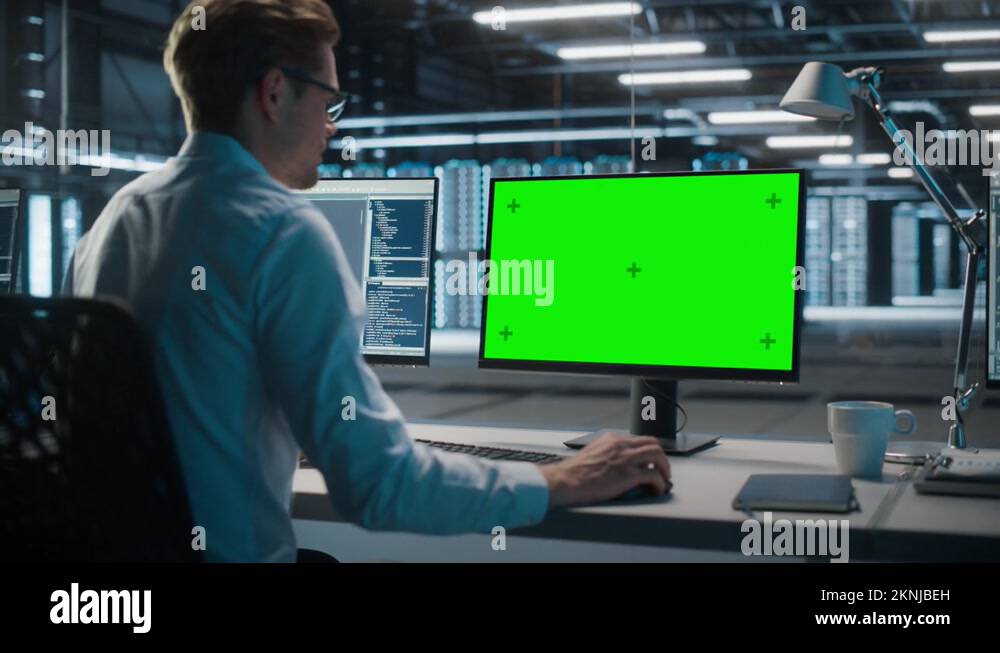 Specialist Working on Green Screen Computer in Data Center.mov Stock Video Footage - Alamy