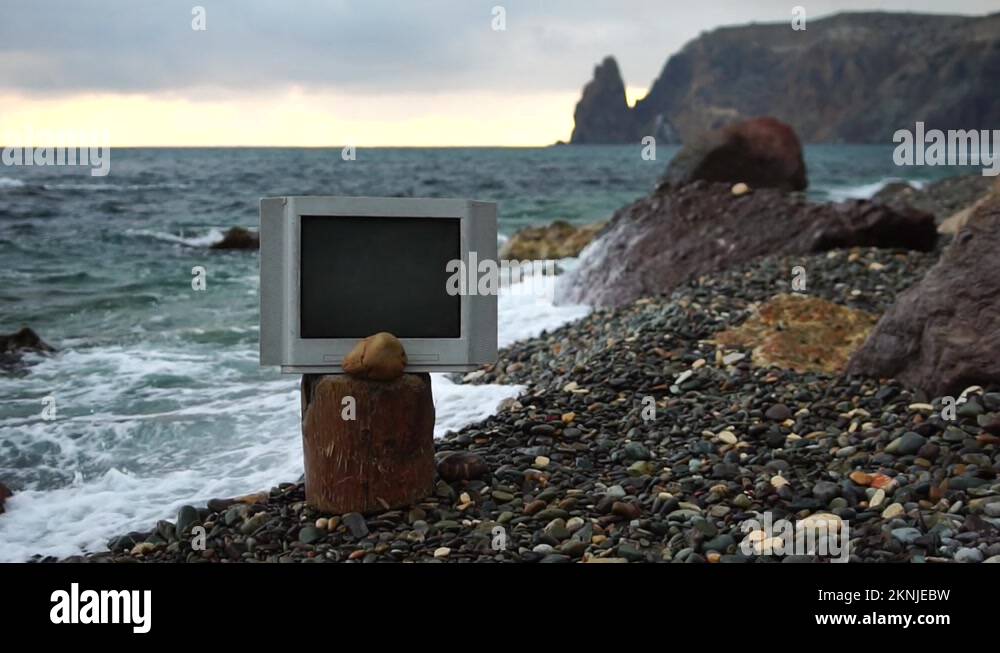 Vintage, old fashioned TV on the beach. Authentic view of forgotten old ...