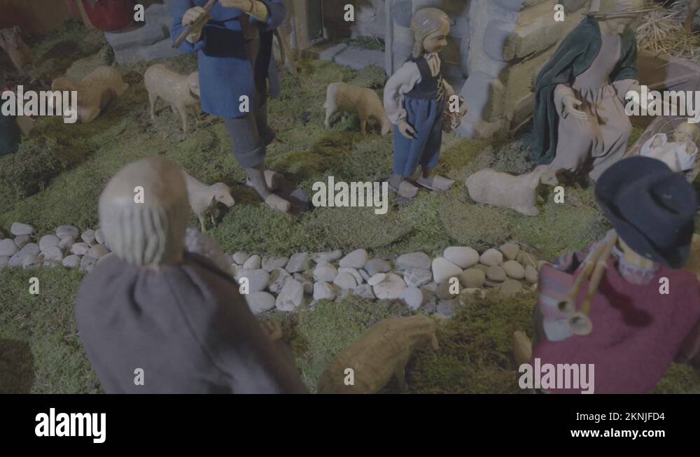 The shepherds come to the Christ child in the stable in a nativity ...