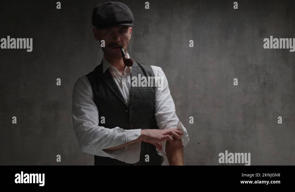 Man pipe smoking cap Stock Videos & Footage - HD and 4K Video Clips - Alamy