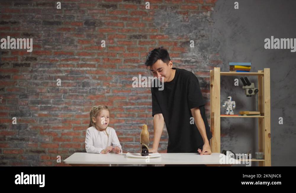 Girl with man do experiment with soda drink and pop candy Stock Video ...