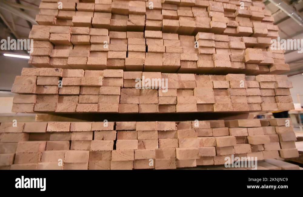 Warehouse for square processed wood bars. Preparation of bars for ...