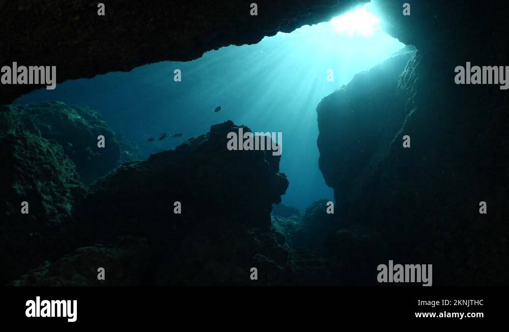 sun ray beams underwater cave light scenery scuba divers to see ...