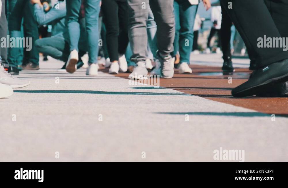 Legs of Crowd People Walking on the Street, Close-up of People feet ...