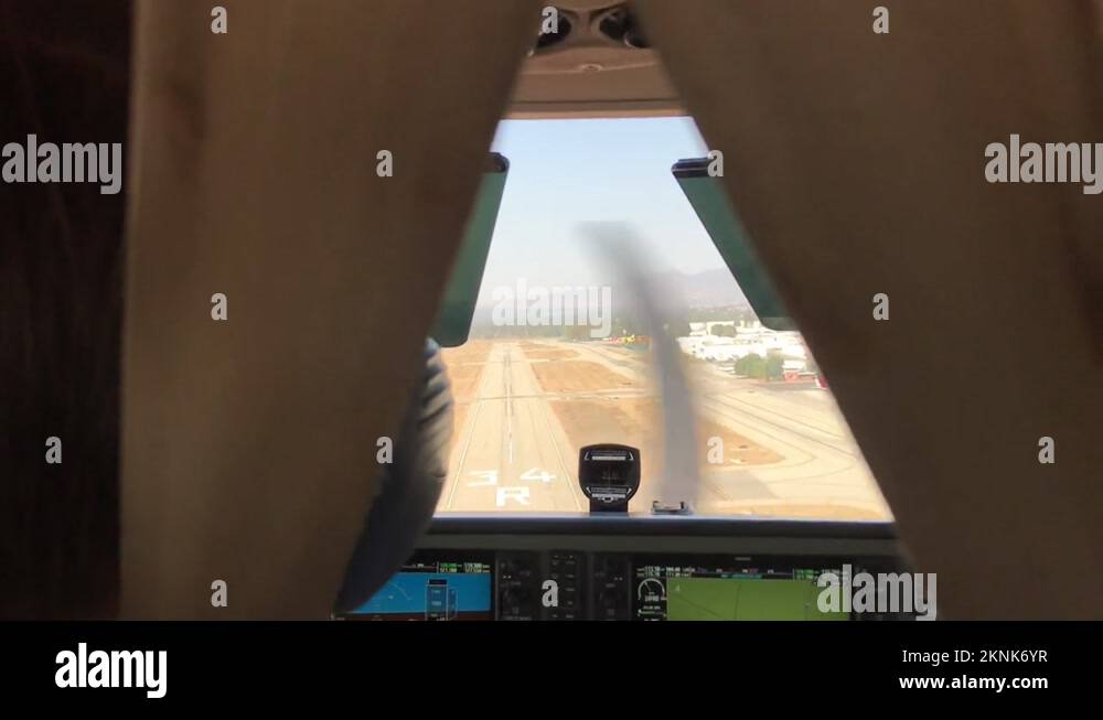 Landing an airplane on runway Cockpit View Stock Video Footage - Alamy