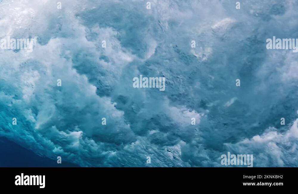 Ocean wave. Powerful clear ocean wave rolls and breaks on the surf spot ...