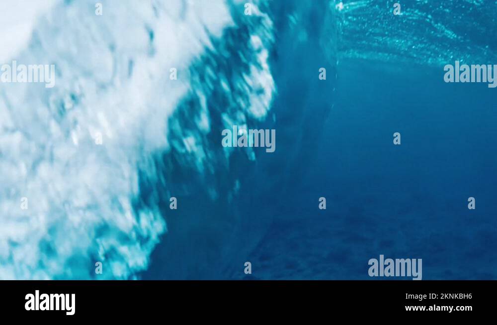 Ocean wave. Powerful clear ocean wave rolls and breaks on the surf spot ...