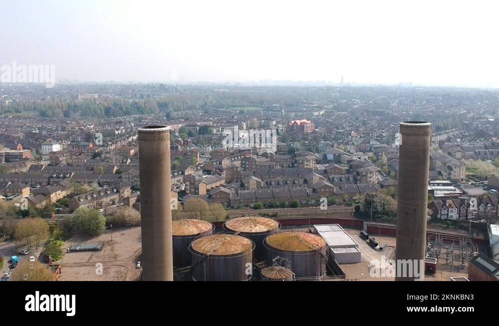 The disused Neasden power station in London with giant chimneys and old ...