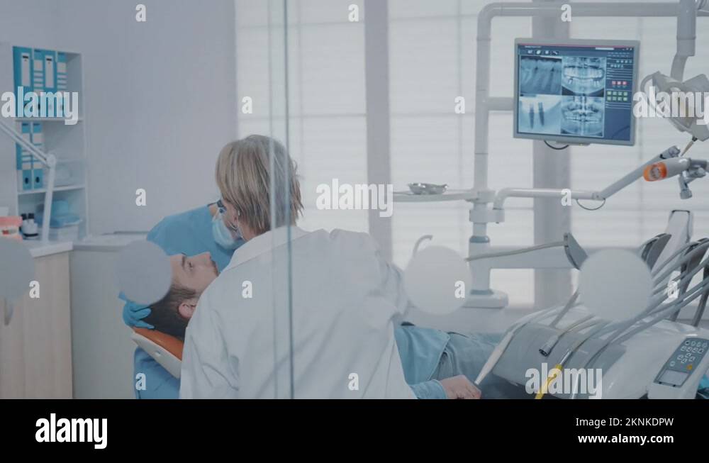 Nurse and stomatologist using drill tool to remove caries Stock Video ...