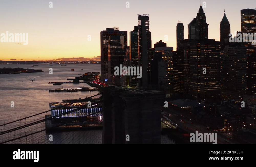 Orbit shot around American flag on top of suspension tower of Brooklyn ...
