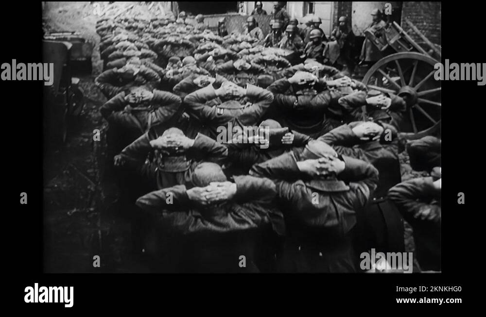 1940s: Captured German soldiers marched through town. Bombed out city ...