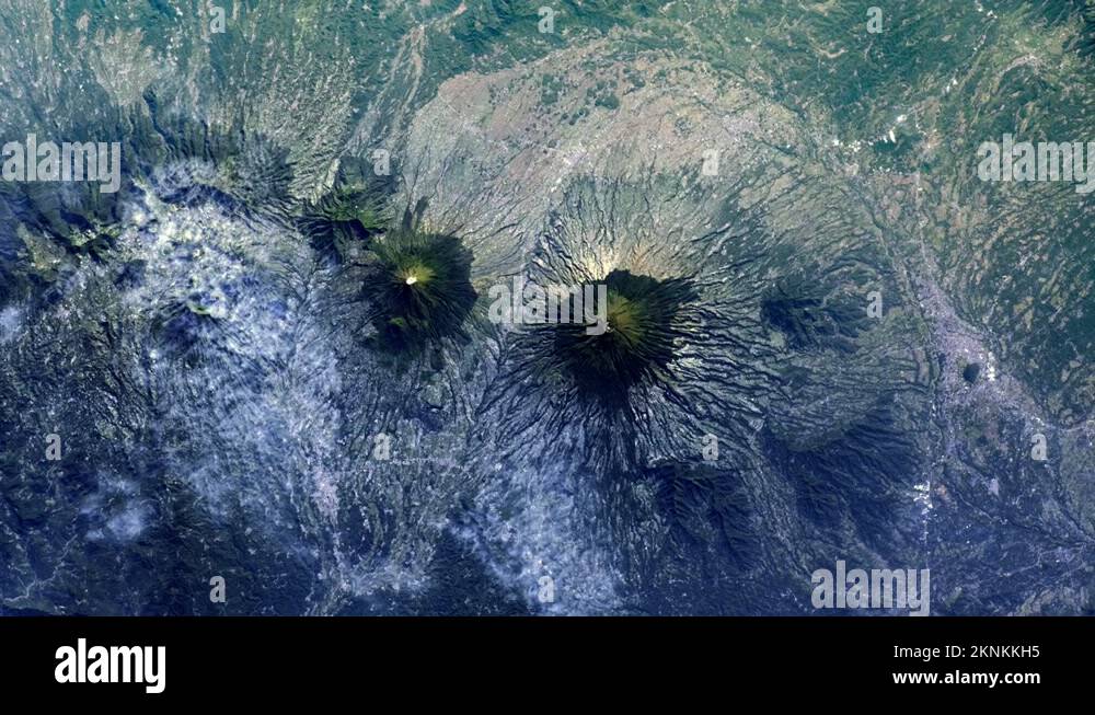 Volcano peaks aerial satellite view from space landscape, Indonesia ...