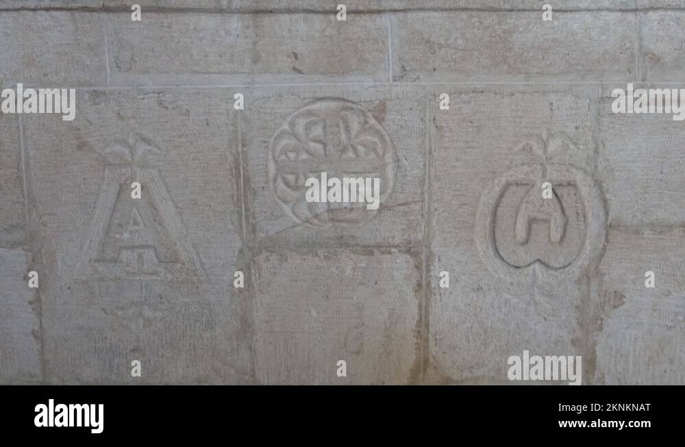 Symbols engraved on the altar in the cave church of Saint Peter Stock ...
