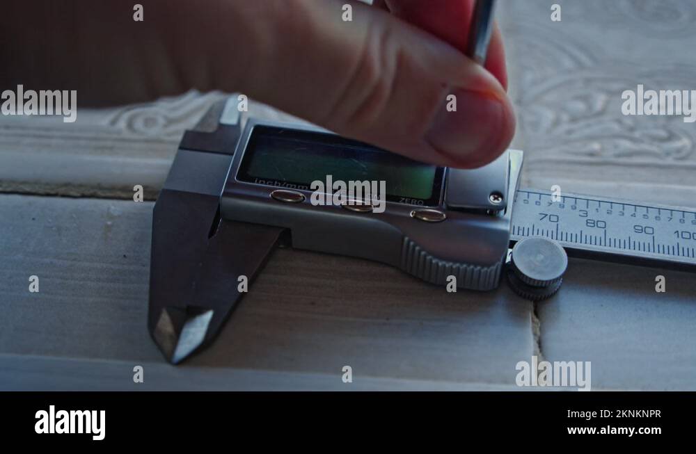 Man caliper measuring Stock Videos & Footage - HD and 4K Video Clips ...