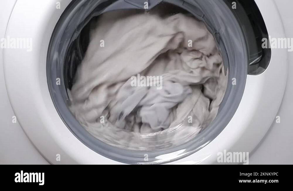 Washing clothes in a washing machine. Slow motion Stock Video Footage ...