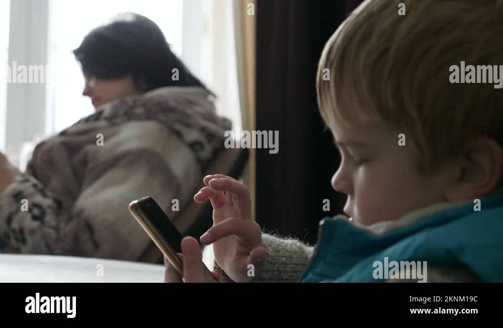 Child Kid Boy Use Watching Smartphone Internet Social Media. Mother ...