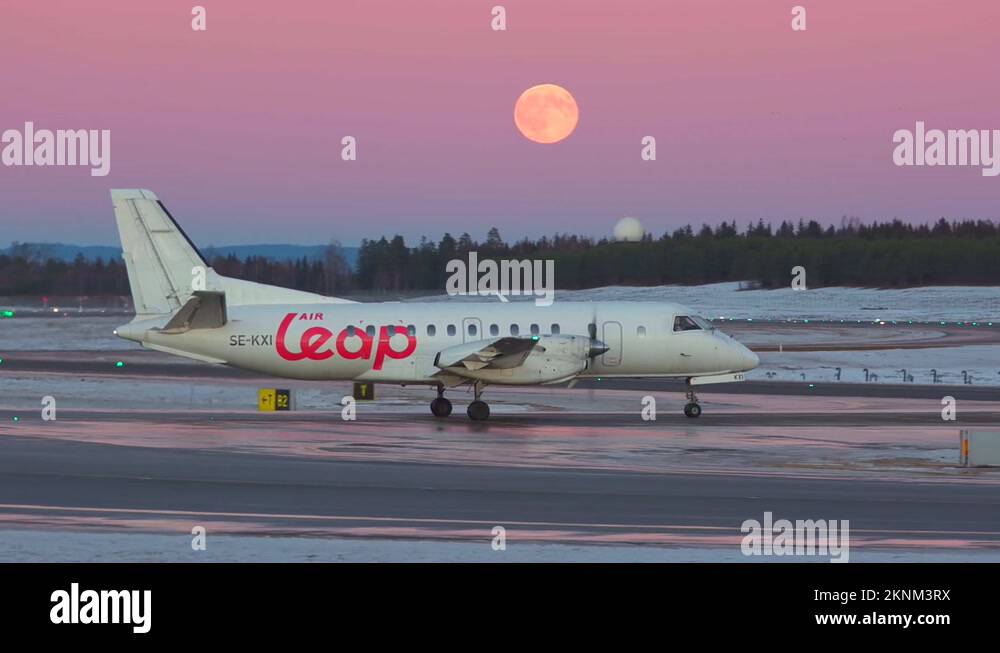 propeller airplane air leap taxiing passing full moon pantone night sky ...