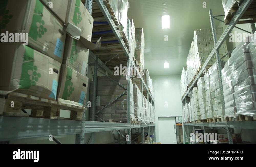 Boxes of groceries in a industrial food large cold storage safety ...