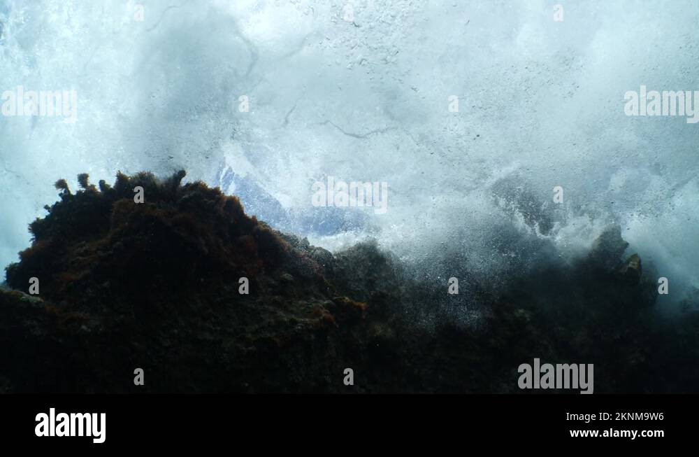choppy underwater wave rocks foam on the surface ocean scenery ...