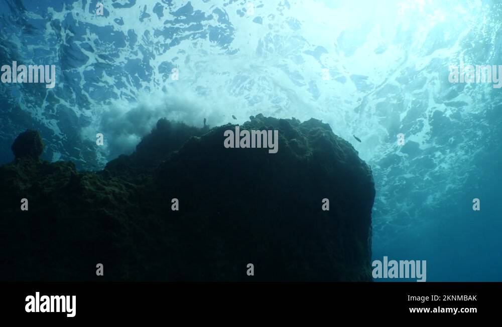choppy underwater wave rocks foam on the surface ocean scenery ...