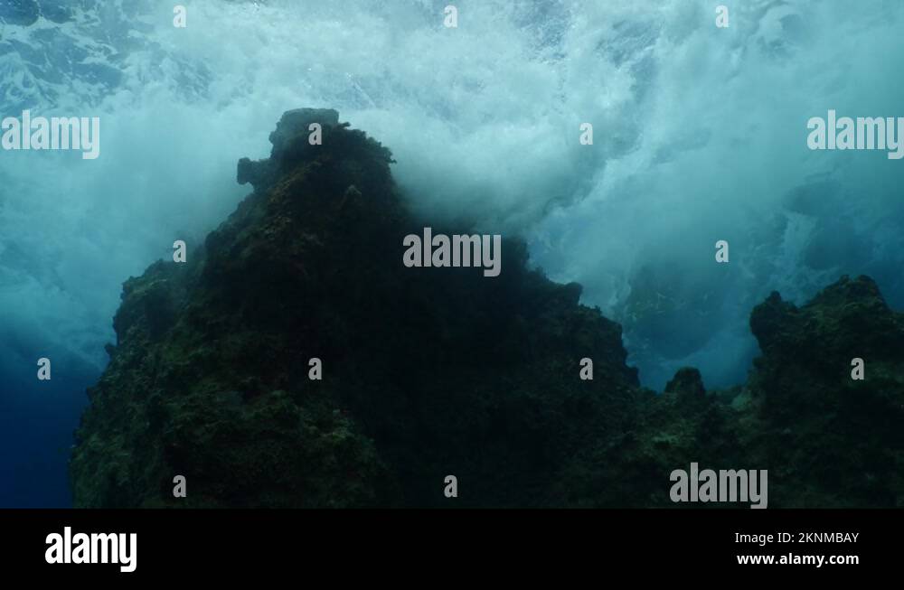 choppy underwater wave rocks foam on the surface ocean scenery ...