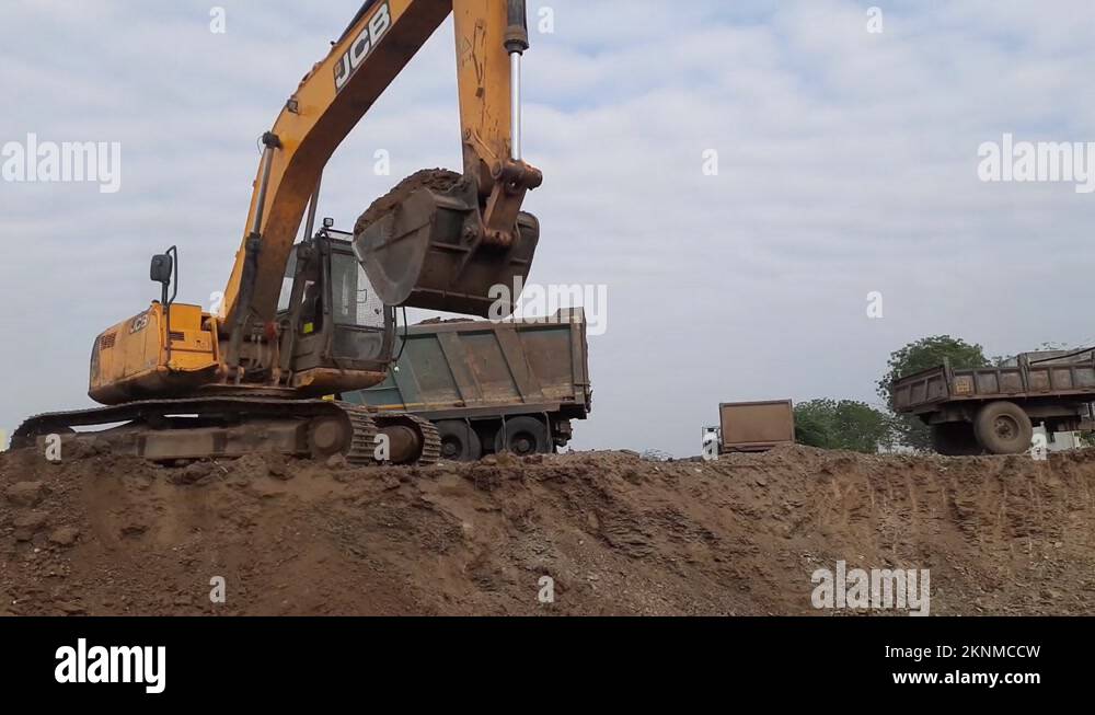 Land mafia stealing sand using operational excavator India Stock Video ...