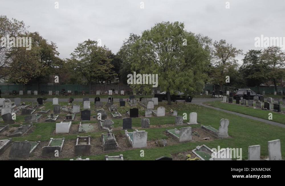 Burial in cemetery, funeral service staff preparing funeral car Stock ...