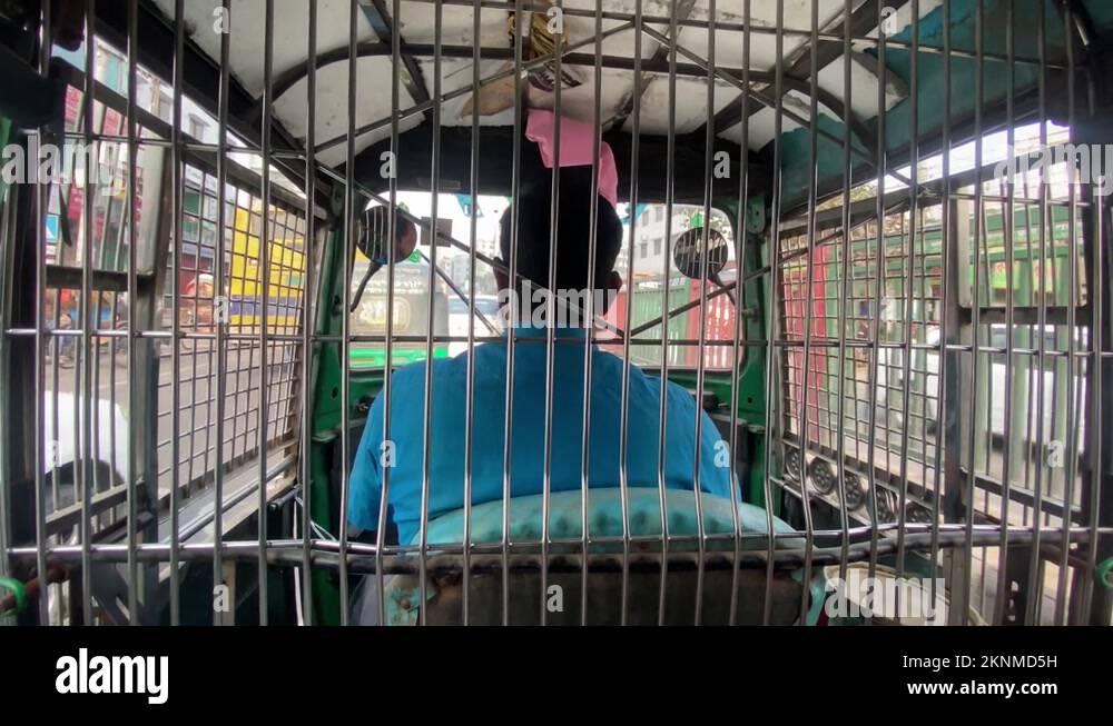 POV Inside A Tuk Tuk CNG Auto Rickshaw Behind Driver Going Through ...