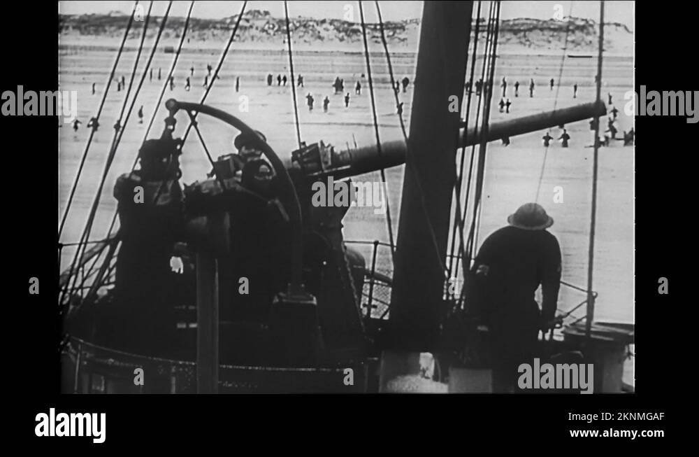 France 1940s: Soldiers march. Dunkirk sign. British soldiers on a beach ...
