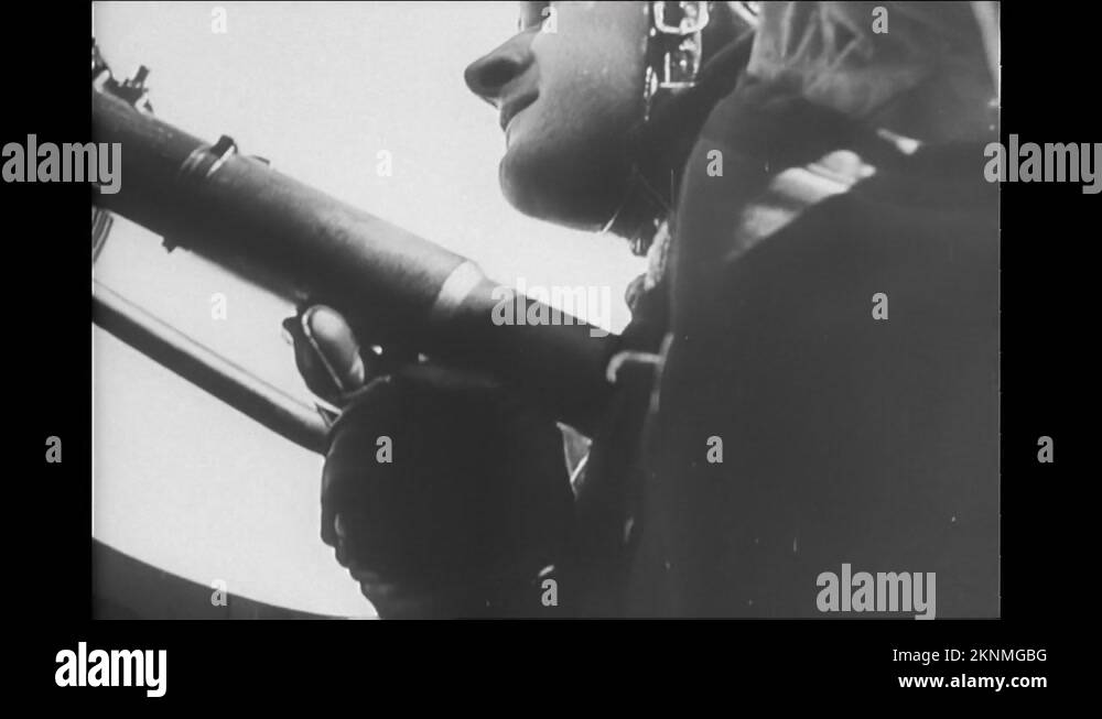 1940s: German bomber planes fly in formation over mountains and fields ...