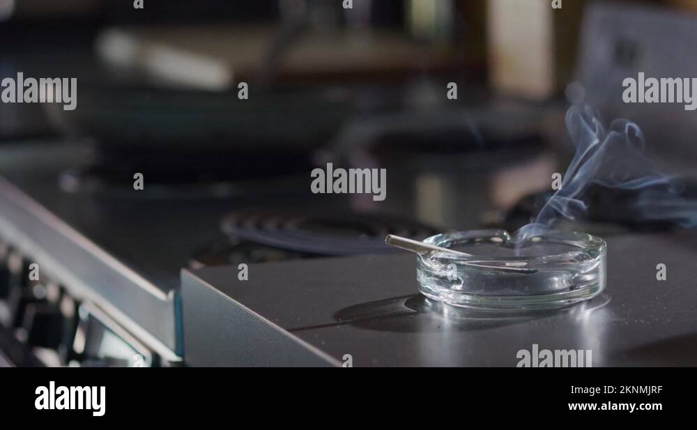 Ashtray ash pot Stock Videos & Footage - HD and 4K Video Clips - Alamy