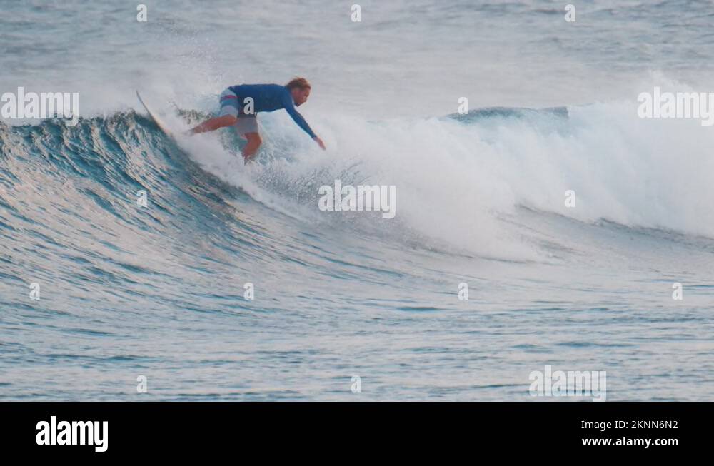 Man surfs the wave in the ocean. Sultans surf spot in Maldives Stock ...