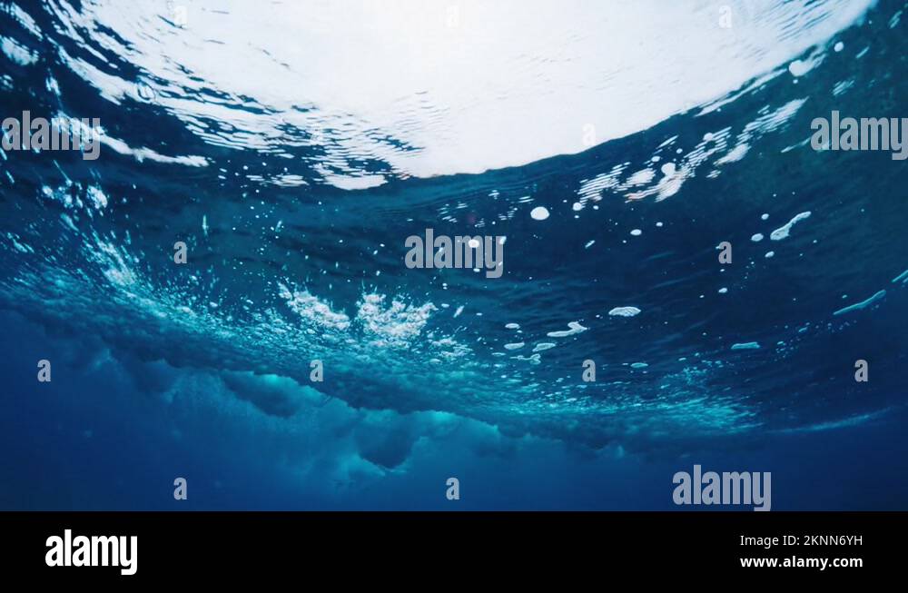 Ocean wave breaks at Sultans surf spot in Maldives. Tropical crystal ...