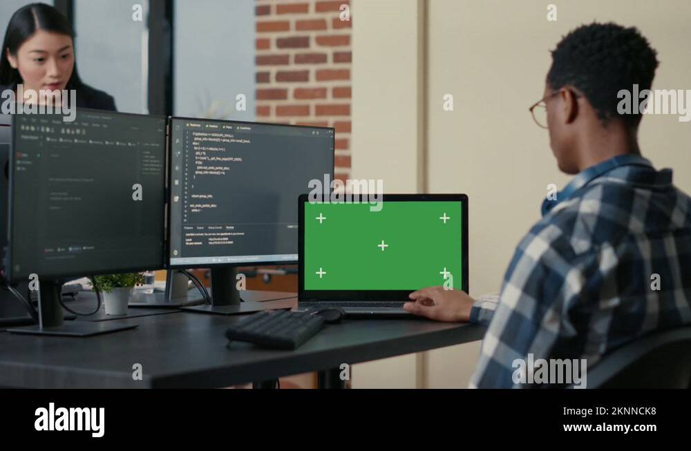 Database designer writing code using laptop with green screen chroma key mockup Stock Video ...
