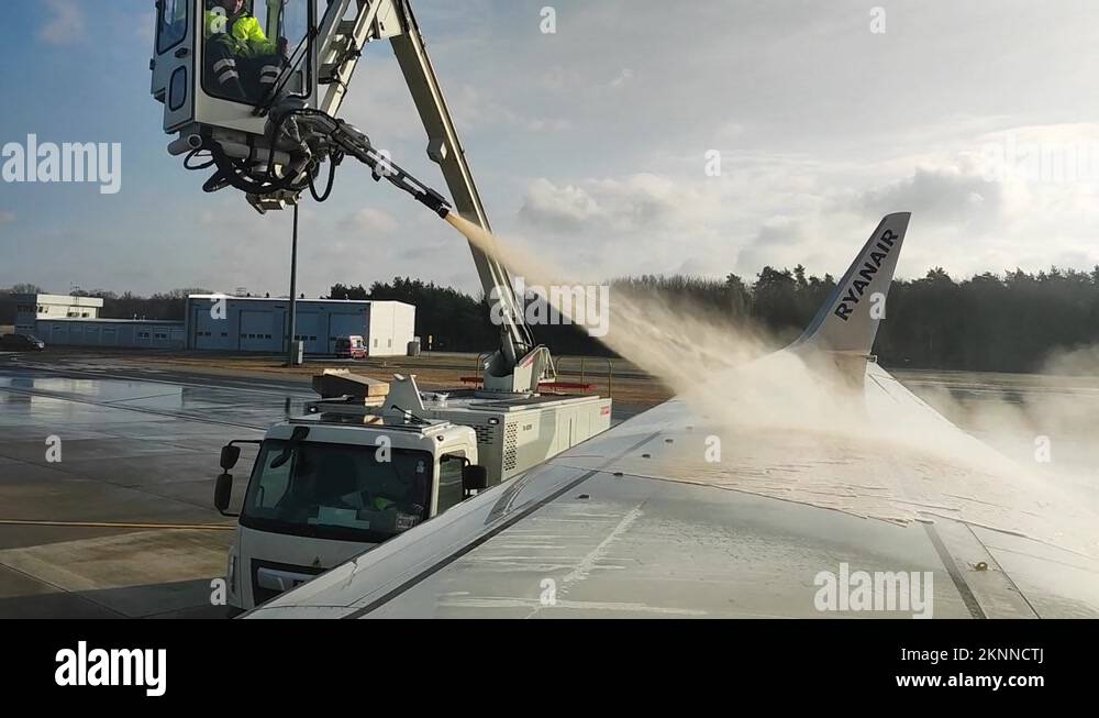 applying anti-icing protection to an aircraft wing Stock Video Footage ...