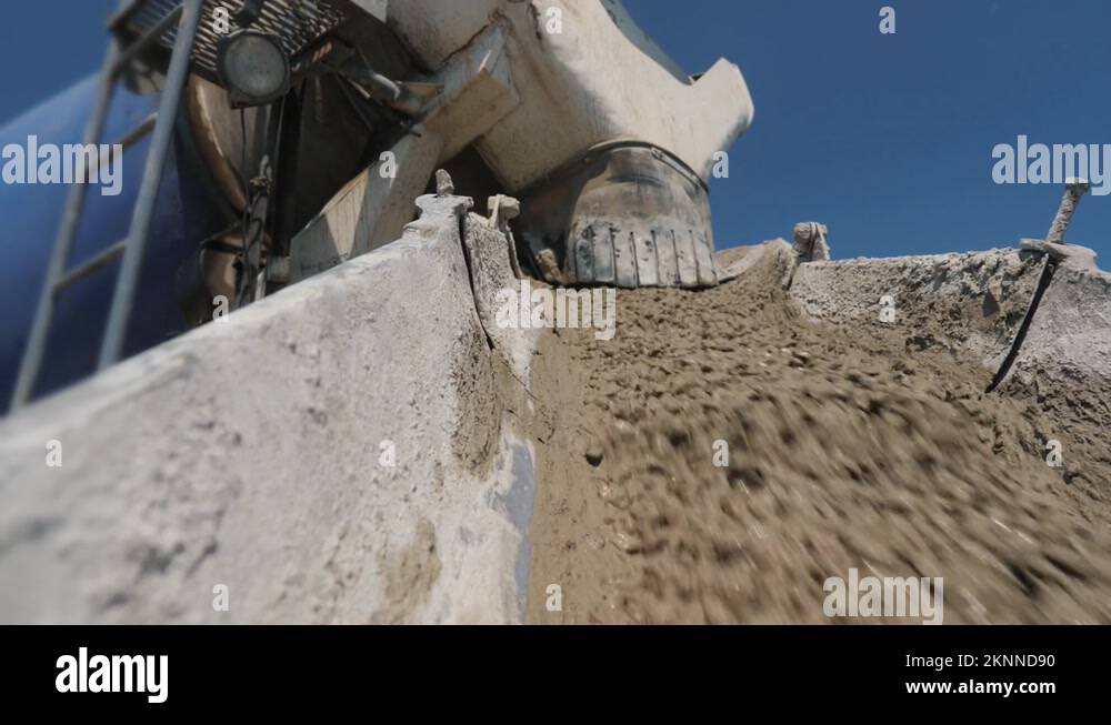 The process of unloading concrete from a concrete manes Stock Video ...