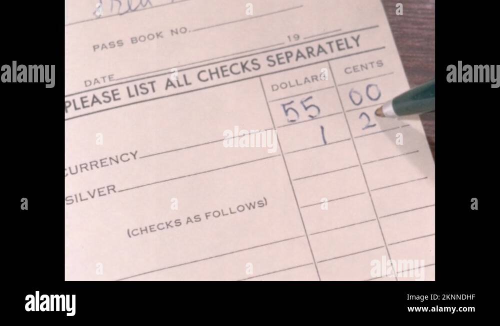 1960s: Bank statement. Person writes entries in bank book Stock Video ...