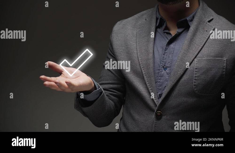 evaluation concept. a businessman showing check mark Stock Video ...