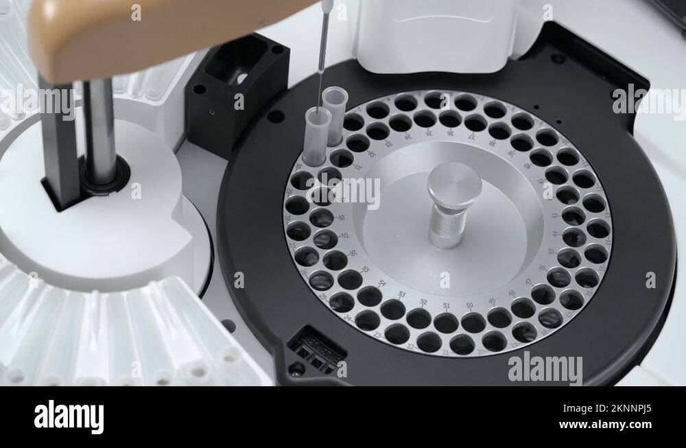 Process Of Needle Probe Pouring The Reagent Into Tubes For The Test ...