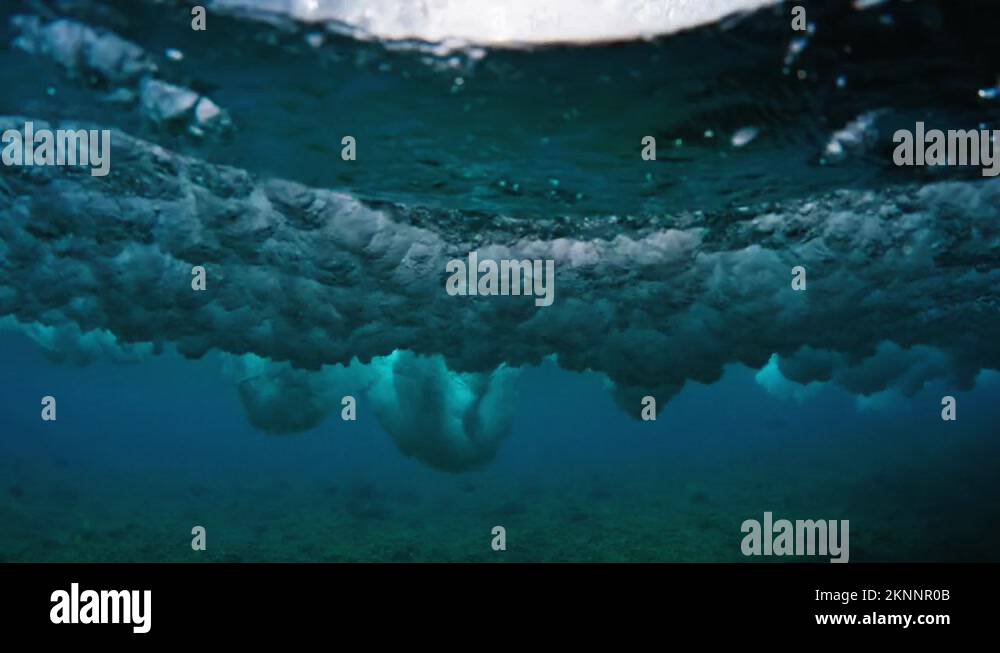 Ocean wave. Crystal clear ocean wave breaks right on camera in Maldives ...