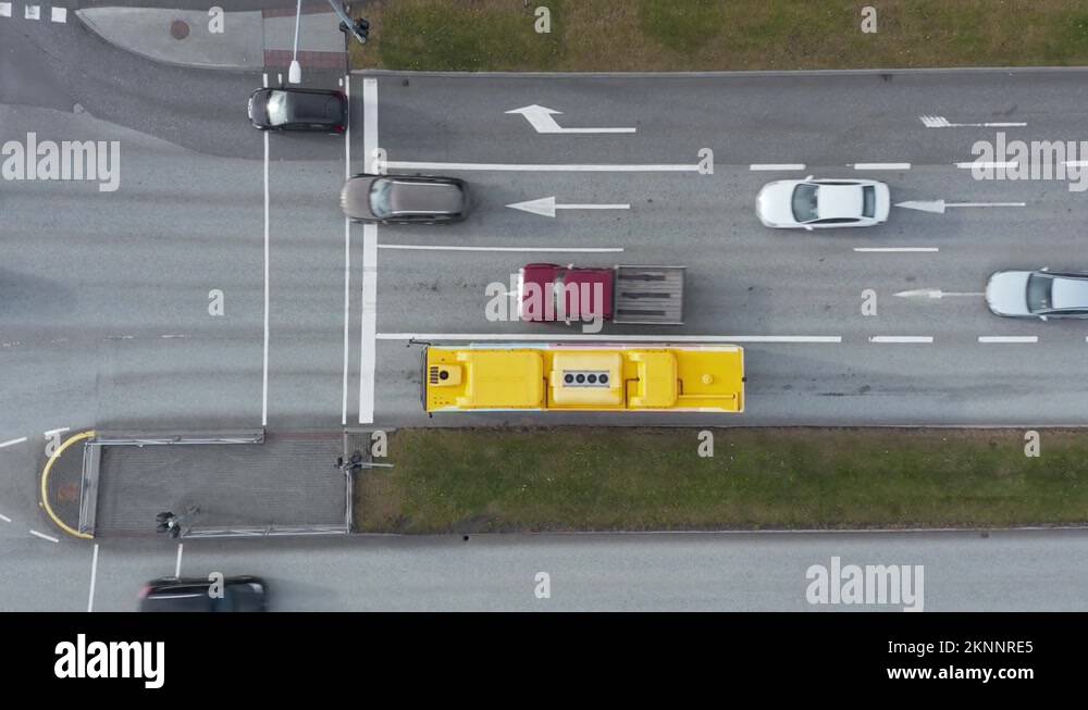 Cars moving along crossing intersection during green traffic light ...