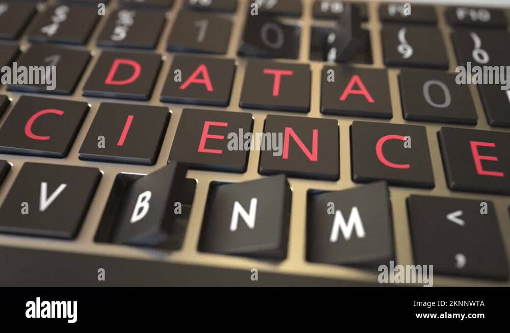 DATA SCIENCE text being revealed with flipping keys of computer ...