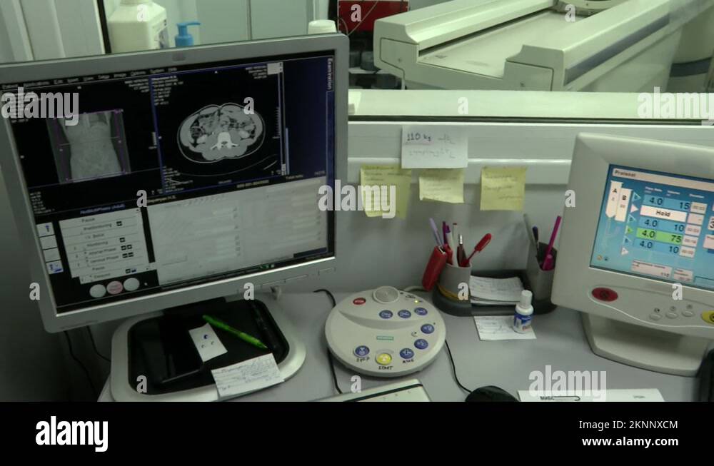 Patient Undergoes MRI or CT Scan Process under Supervision of ...