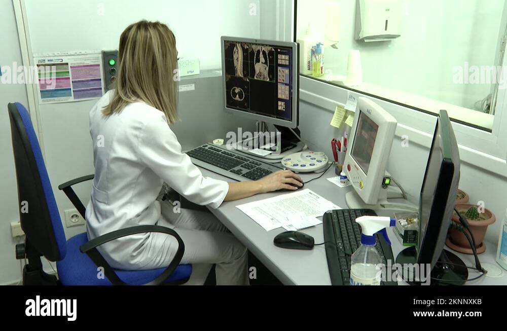 Patient Undergoes MRI or CT Scan Process under Supervision of ...