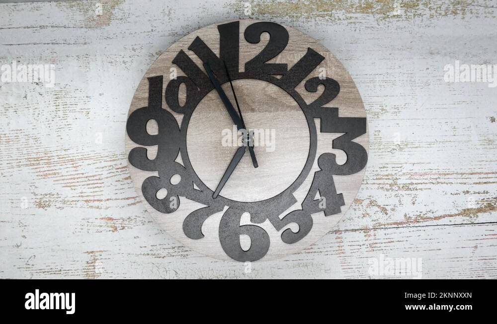 The Time On The Clock Seven. Wooden Clock With The Black Arrow And The ...