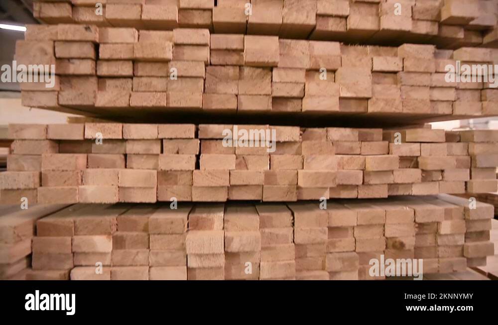 Warehouse for square processed wood bars. Preparation of bars for ...