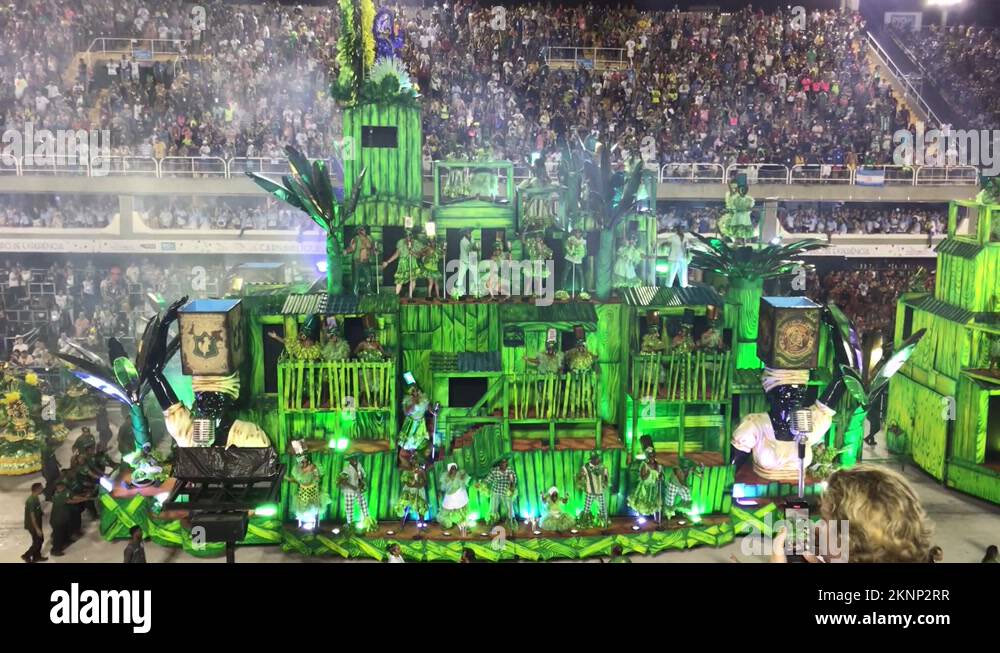 People with costumes, wigs and make ups enjoying Bloco, part of the ...