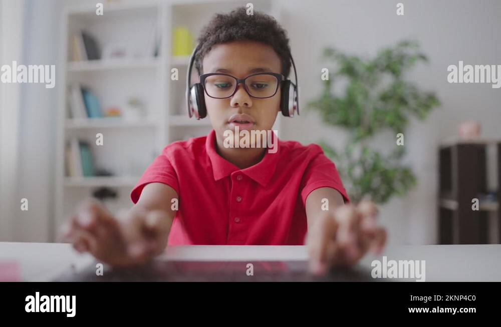 Kid typing laptop Stock Videos & Footage - HD and 4K Video Clips - Alamy